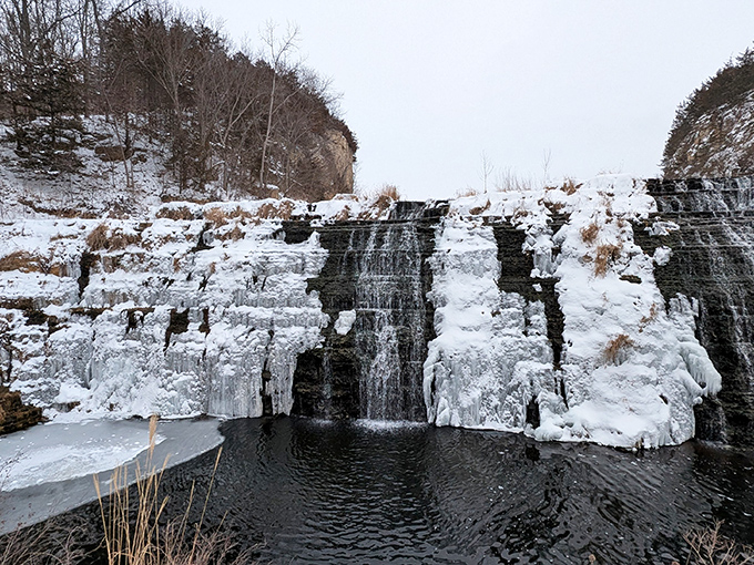 Winter transforms Thunder Bay Falls into nature's ice sculpture garden. Suddenly that "frozen assets" joke from your financial advisor seems strangely profound.