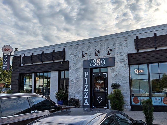 1889's striking black and white exterior is architectural pizza poetry. Sleek and sophisticated, yet welcoming to all.