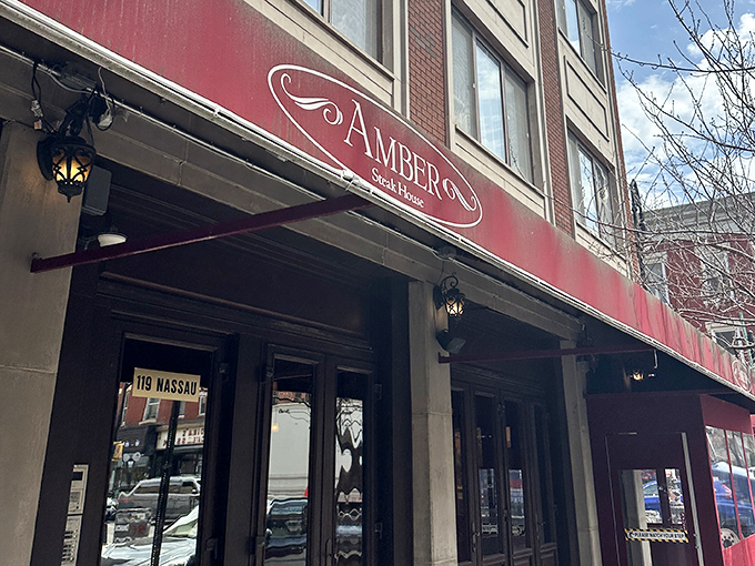 Amber Steak House keeps it classic with that signature red awning. Brooklyn's answer to Manhattan's steak scene.