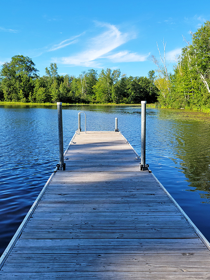Governor Thompson State Park's wooden dock invites you to walk its planks and contemplate life's big questions&mdash;or just the fish below.