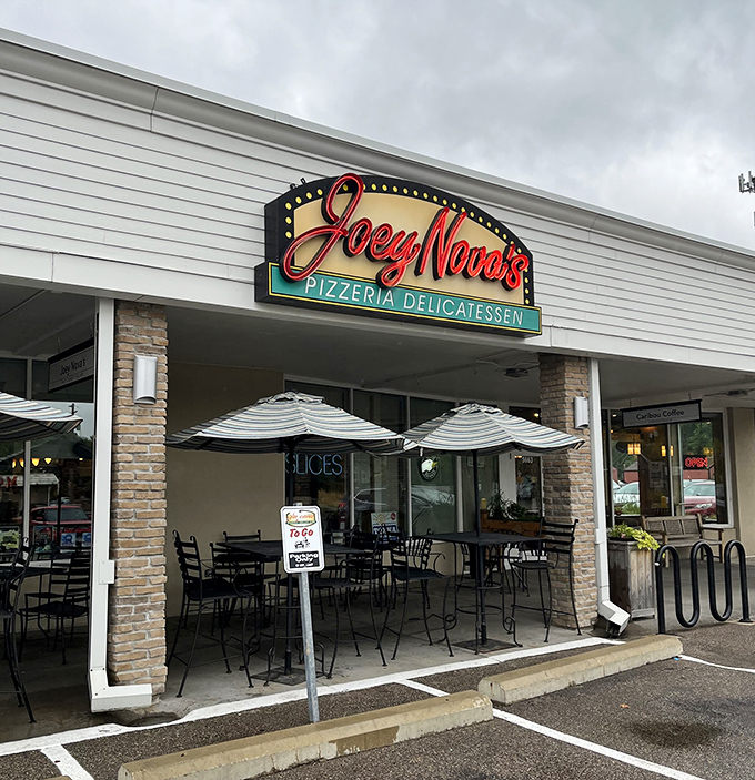 Joey Nova's Pizzeria: That colorful sign glows with personality and pizza promise. The stone columns add just enough class without the sass.