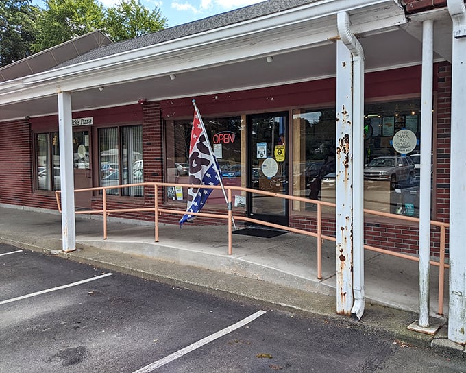 The simple storefront hides pizza greatness within. Nick's proves you should never judge a pizza by its building's cover!