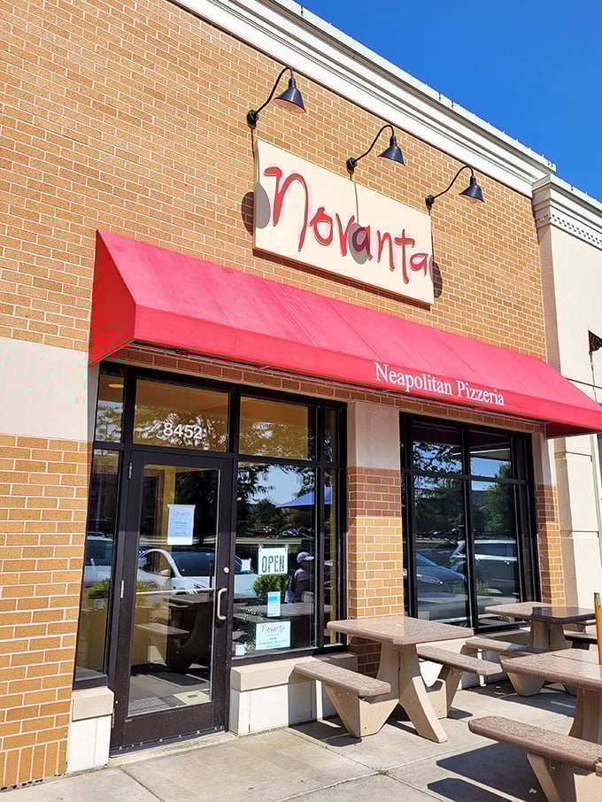 Novanta's bright red awning signals authentic Neapolitan pizza ahead - no passport required for this Italian vacation. 