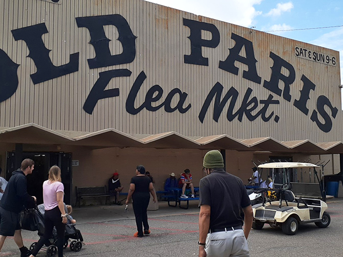 "Old Paris Flea Market" proudly announces itself - a name that's become synonymous with weekend treasure hunting.