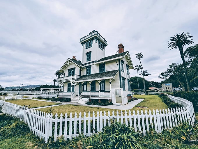 With ornate details and cheerful colors, this lighthouse brings serious charm to the busy harbor below. 