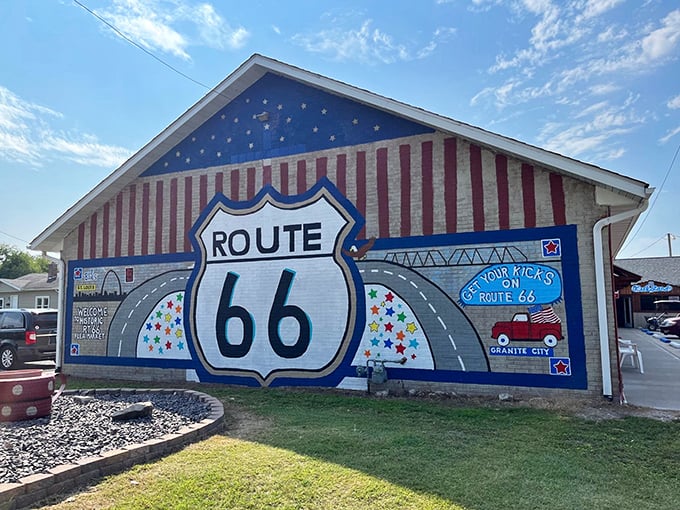 Route 66 nostalgia comes alive on this patriotic mural, promising a journey through America's attic inside.