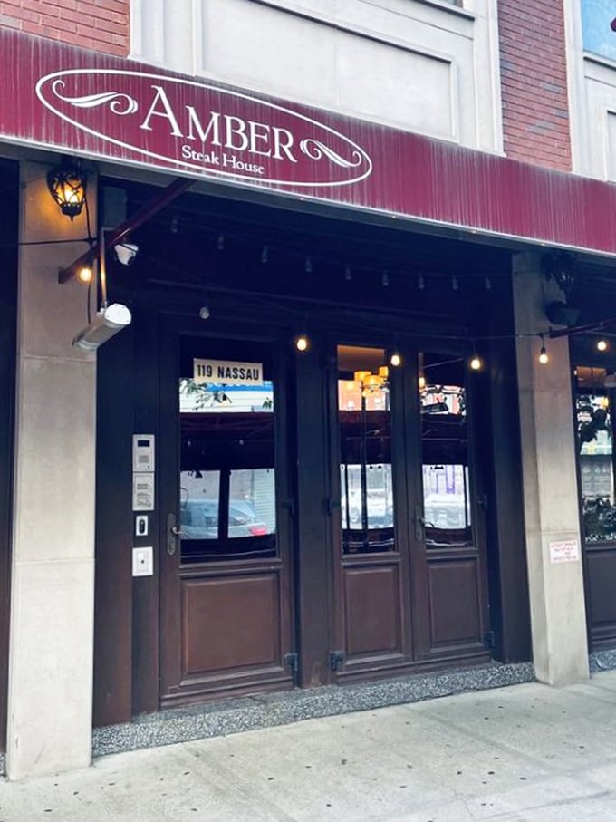 Simple, elegant, and ready for business. Amber's entrance promises meaty delights without unnecessary flash.