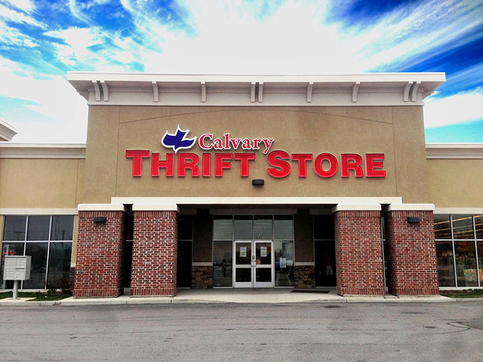 The bright red lettering stands out against Utah's blue skies, promising a day of discoveries that benefit more than just shoppers.