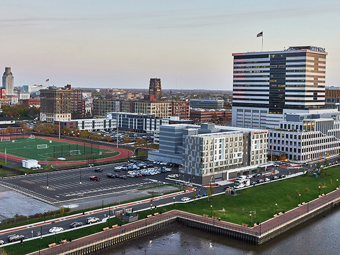 The Delaware River frames this evolving cityscape - where waterfront living doesn't require a millionaire's budget.