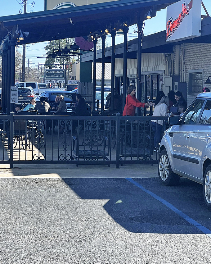 Simple exterior, extraordinary pizza. The wooden door might as well be a portal to flavor country.