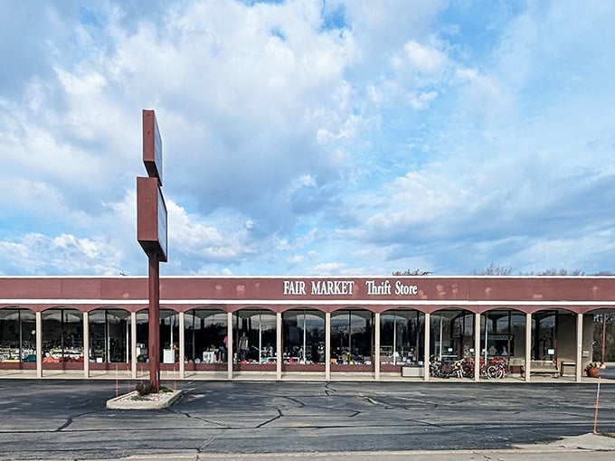 Blue skies and red signs! Fair Market's expansive storefront promises a day of successful treasure hunting.