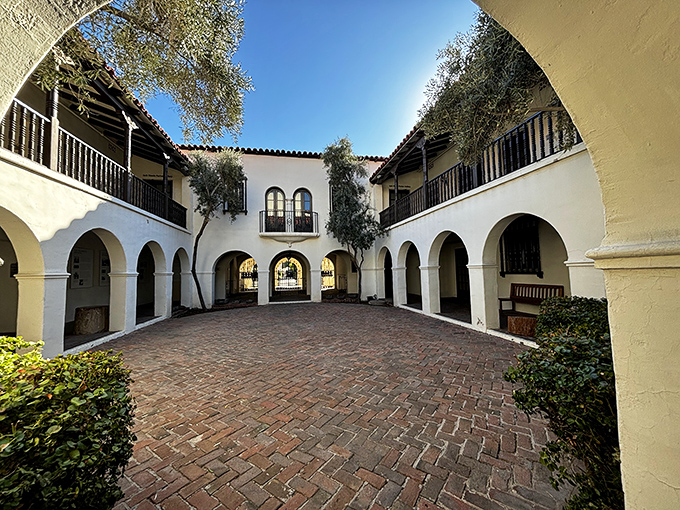 Graceful arches and shady walkways surround the inner courtyard of this world-renowned showcase for Native American art and culture.