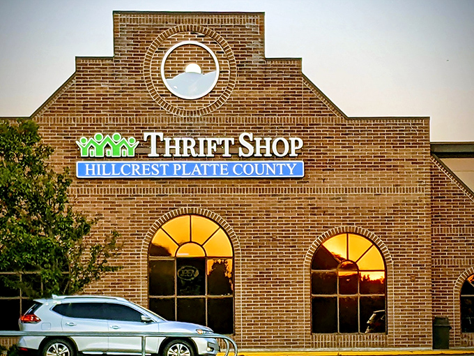 Sunlight warms the elegant arched windows of Hillcrest Thrift Shop. Even the building knows this place is special!
