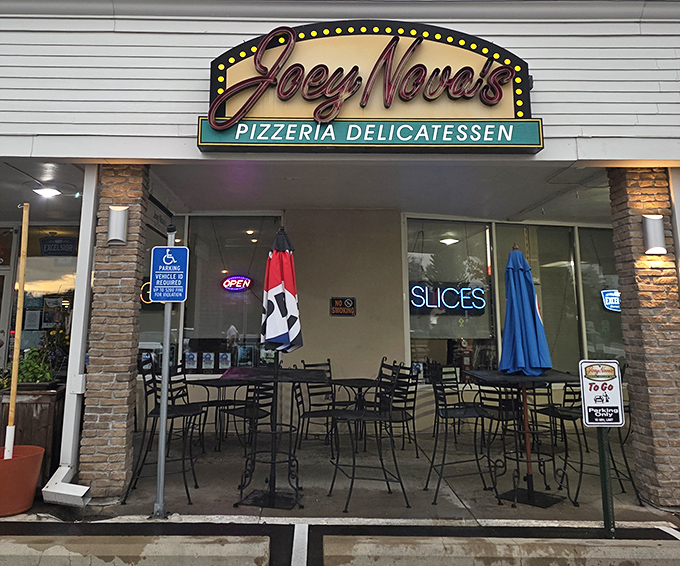 Joey Nova's Pizzeria: The outdoor seating beckons with the universal invitation of all great pizza joints: "Stay awhile, have another slice."