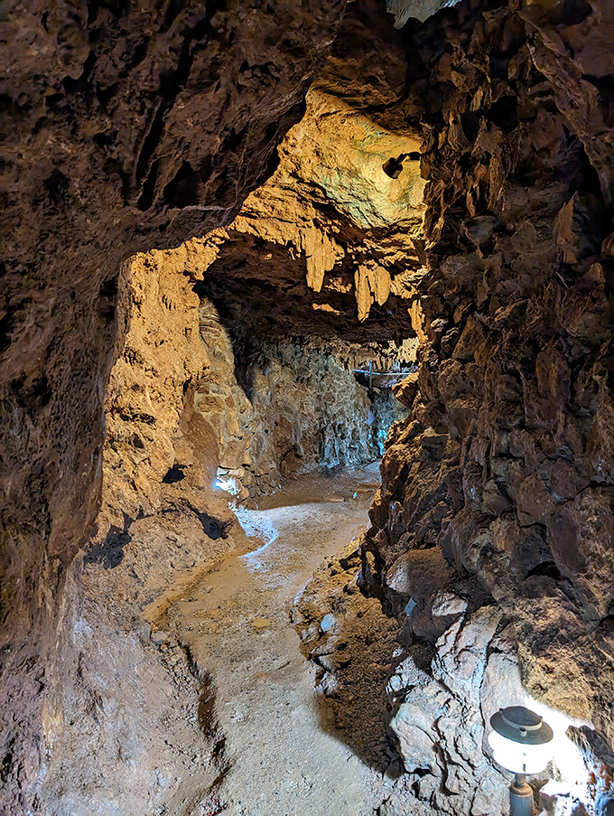 Massive formations loom overhead in this subterranean cathedral. If Michelangelo had seen these ceilings, he might have reconsidered his career path!