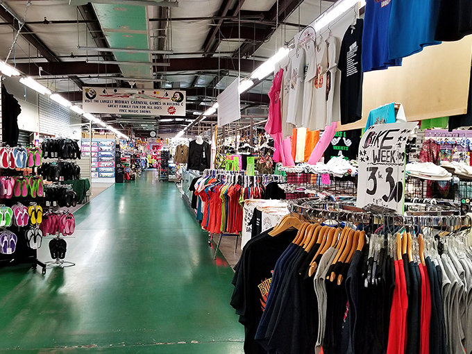 Bright green floors guide shoppers through endless aisles where tourist treasures meet local finds in perfect vacation harmony.