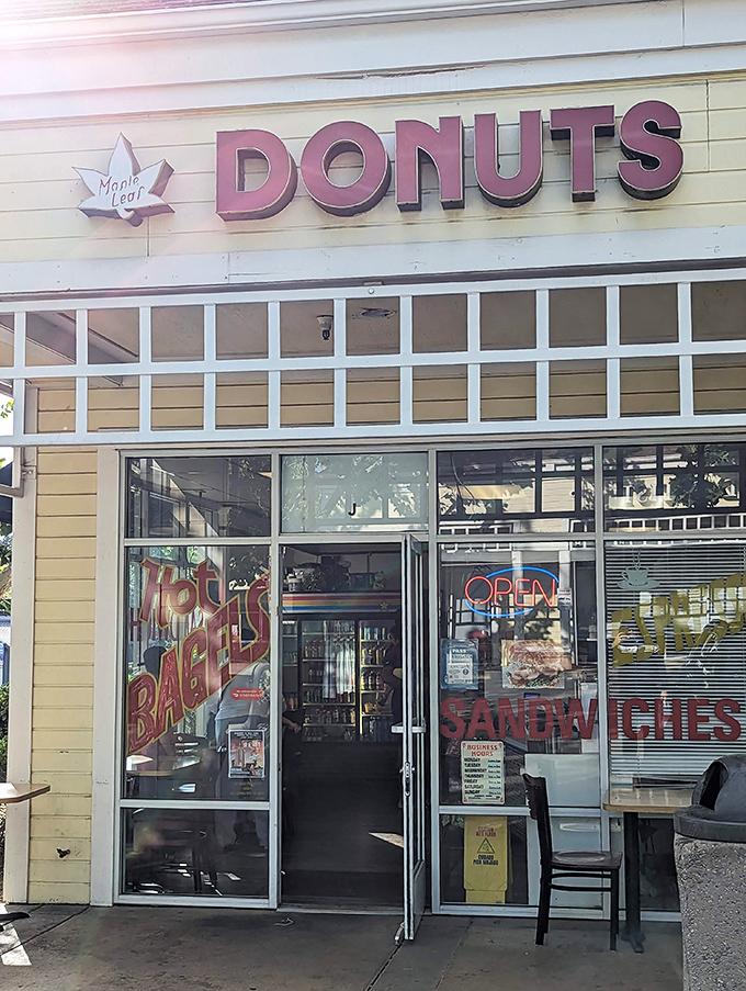 The classic "DONUTS" sign at Maple Leaf speaks a universal language that needs no translation.