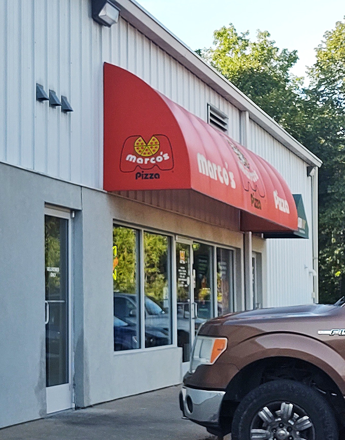 No fancy frills needed! Marco's clean storefront lets their pizza do all the talking.