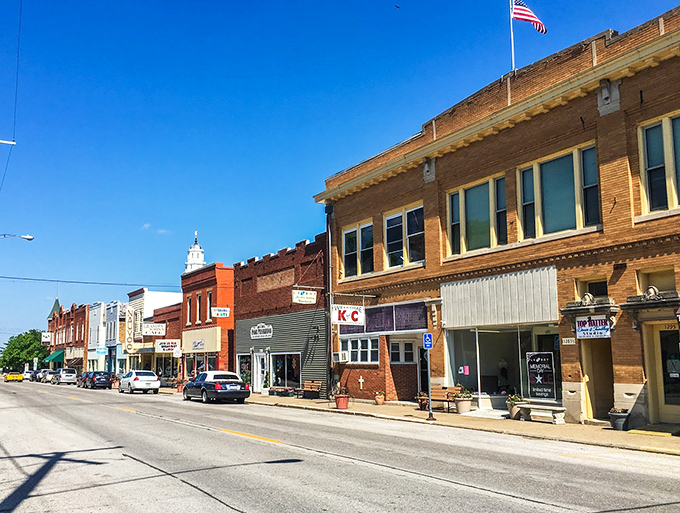 The gleaming white Nauvoo Temple stands as a beacon on the hill, visible for miles across the Mississippi River's wide, winding waters.
