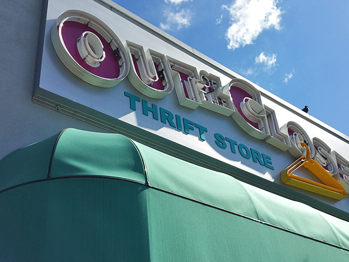 The bright teal lettering of Out of the Closet beckons like a friendly neighbor. Come for the deals, stay for the good karma!