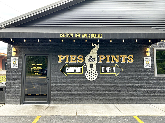 Those large windows at Pies & Pints invite you to peek inside, where craft beer and creative pizza toppings await.