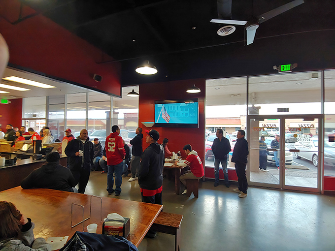 The unassuming storefront of Pizza Plus is like a poker face&mdash;hiding a winning hand of flavors inside. 