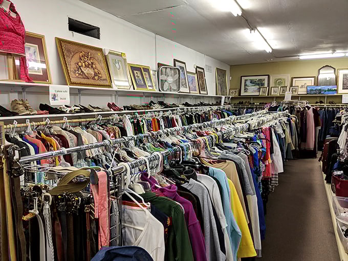 Artwork that once graced someone else's walls waits for its next admirer in this well-lit space.