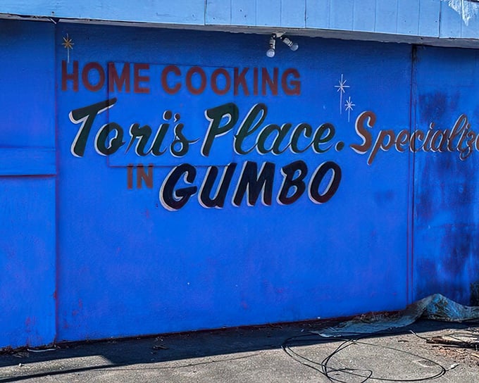 The vibrant blue exterior of Tori's Place boldly announces its specialty. Like a culinary bat-signal for gumbo lovers everywhere.