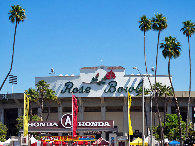 The iconic Rose Bowl Stadium transforms into treasure-hunter heaven once a month, palm trees standing guard over California's most legendary flea market.
