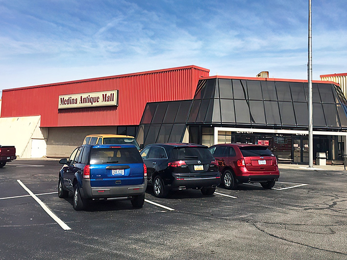 The unassuming red exterior hides a universe of treasures inside, like finding out your quiet neighbor was once a rock star.