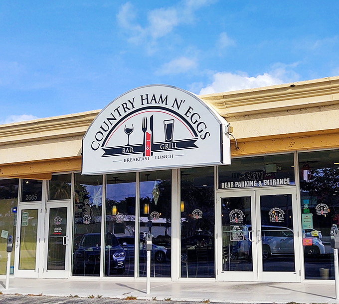 The unassuming exterior of Country Ham N' Eggs belies the culinary treasures within. Like finding a secret breakfast society hiding in plain sight.