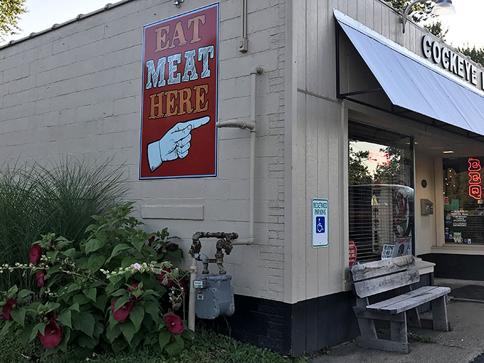 The sign says "EAT MEAT HERE" with a pointing finger, and honestly, has there ever been clearer dining advice? Cockeye BBQ's modest exterior hides smoky treasures within.