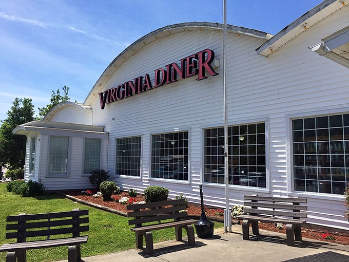The iconic white barn-shaped exterior of Virginia Diner stands like a beacon of comfort food, promising Southern hospitality before you even step inside.
