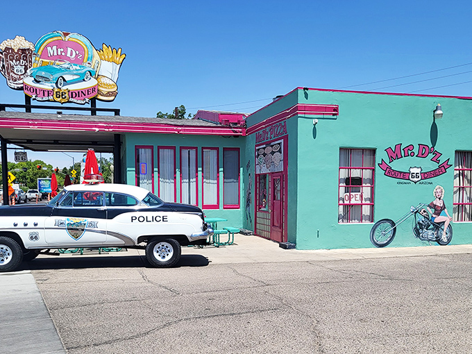 That turquoise and pink exterior isn't just a building&mdash;it's a time machine disguised as a diner. Even the local police can't resist stopping by!