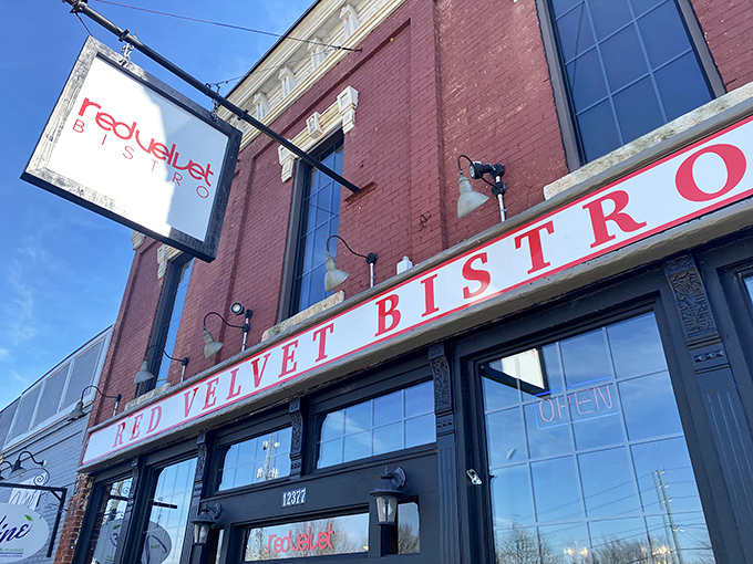 The historic brick fa&ccedil;ade of Red Velvet Bistro beckons hungry travelers with its classic charm and promise of Southern comfort within.