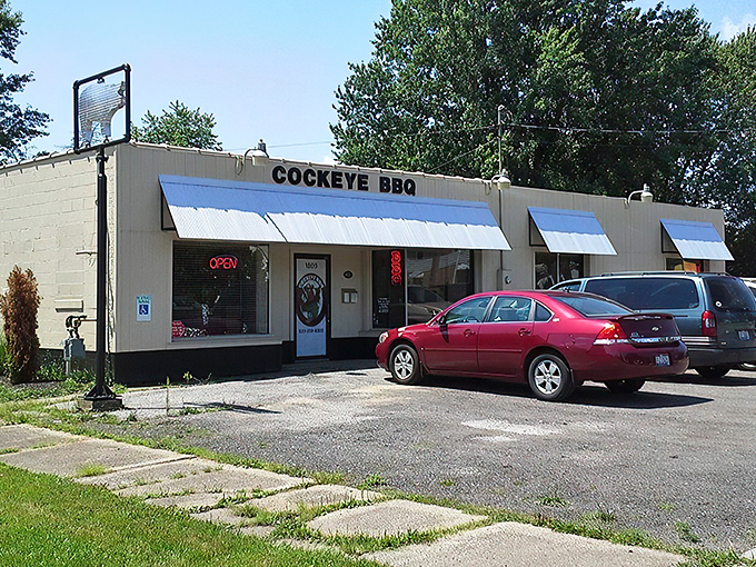 The unassuming exterior of Cockeye BBQ proves the old adage: the less fancy the building, the more life-changing the barbecue inside.