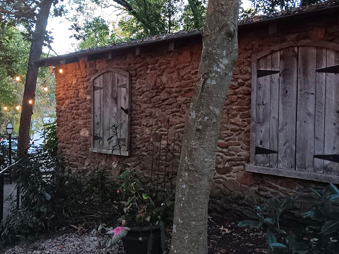 A stone cottage nestled among towering trees isn't just fairy tale scenery&mdash;it's your first clue that The Peddler isn't your average strip mall steakhouse.