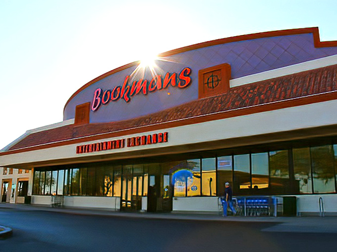 The iconic Bookmans storefront glows like a beacon for treasure hunters, promising adventures that Amazon's "add to cart" button could never deliver.