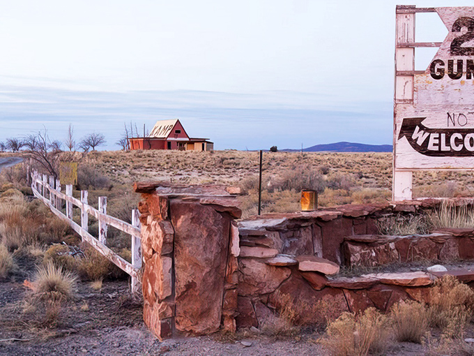 Welcome signs never looked so beautifully weathered &ndash; this desert greeting has stories etched in every crack.