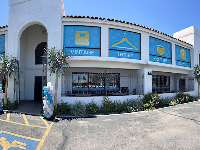 The pristine white exterior of Thrift to Thrive beckons like a siren song to bargain hunters. Those blue window panels aren't just decorative&mdash;they're portals to treasure hunting paradise.