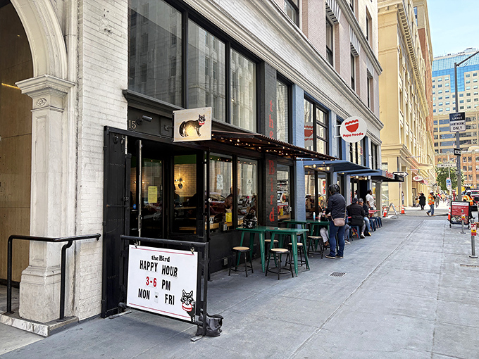The Bird's unassuming storefront in San Francisco's Financial District beckons with its yellow cat logo&mdash;like a culinary lighthouse guiding hungry souls to fried chicken paradise.
