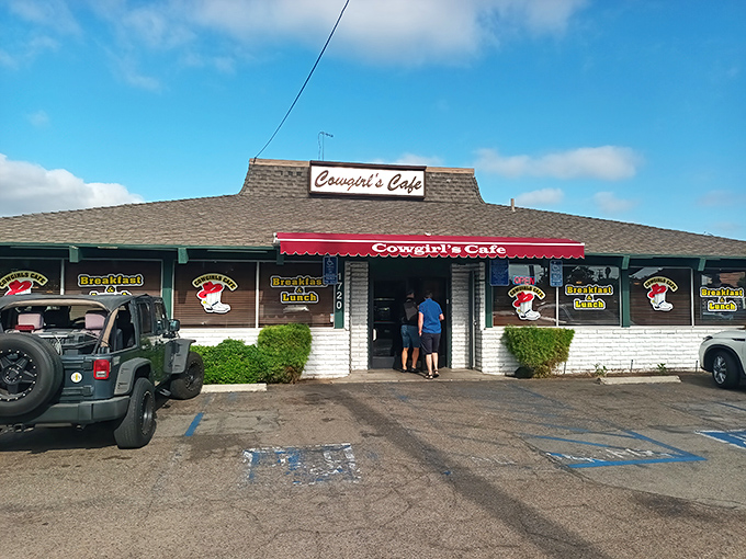 The unassuming exterior of Cowgirls Cafe hides culinary treasures within. Like finding a diamond in a strip mall, this breakfast haven beckons hungry travelers.