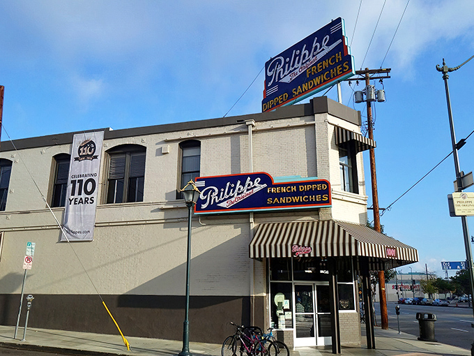 The iconic corner building of Philippe's stands proudly against the LA sky, a beacon of sandwich perfection since the early 20th century.