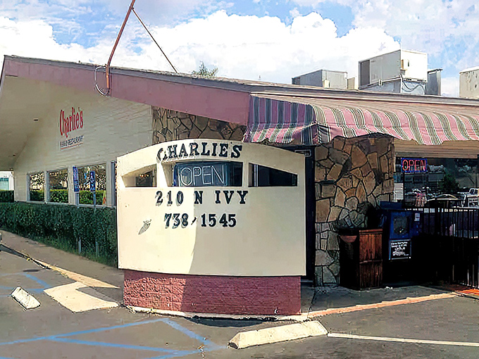 Charlie's iconic exterior stands as a time capsule of classic Americana dining, complete with stone fa&ccedil;ade and vintage signage.