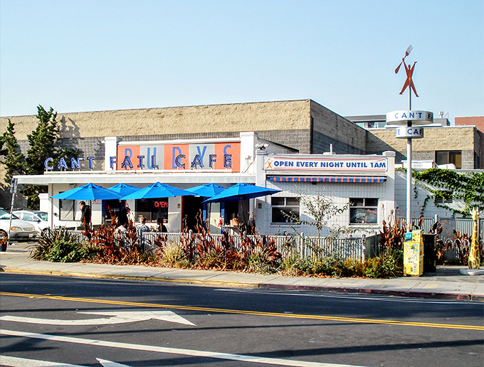The blue awnings and colorful signage of Rudy's Can't Fail Cafe stand like a retro oasis in Emeryville, promising good food and zero pretension.