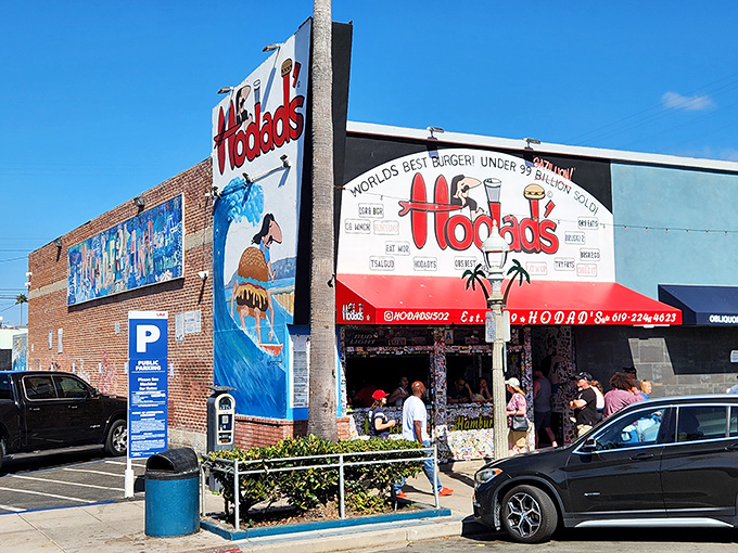 The iconic Hodad's storefront proudly declares "World's Best Burger!" with tongue-in-cheek modesty: "Under 99 Billion Sold!" Pure San Diego surf culture.