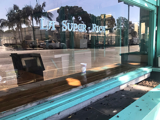 The iconic teal-colored exterior of La Super-Rica beckons like a culinary lighthouse on Milpas Street. Worth every minute in line.