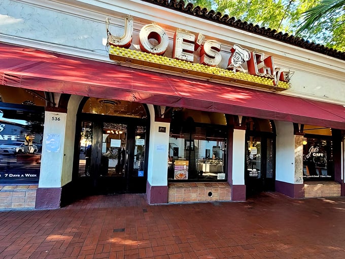The iconic red awning of Joe's Cafe beckons hungry travelers on State Street like a culinary lighthouse guiding ships to delicious harbor.
