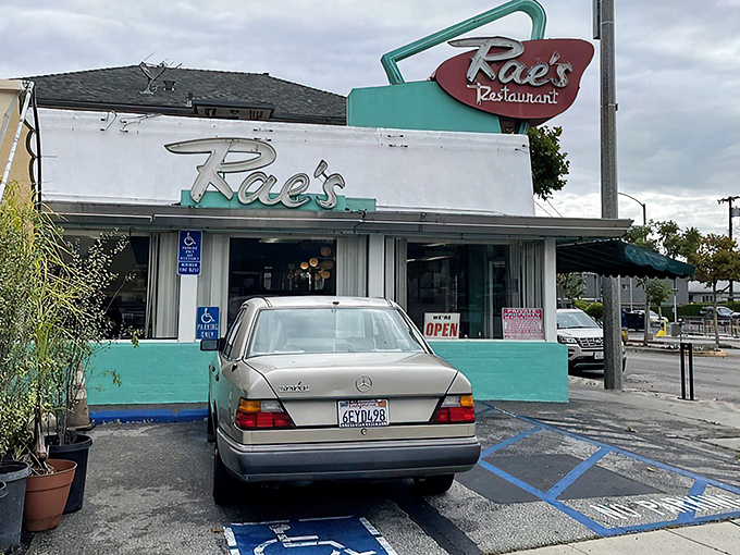 The mint-green facade and vintage neon sign of Rae's stands as a defiant time capsule in a city obsessed with the next big thing.