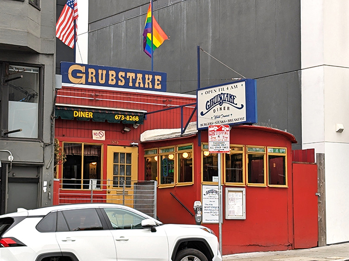 The iconic red exterior of Grubstake Diner stands out like a beacon for hungry night owls, promising Portuguese-American comfort food until the wee hours.